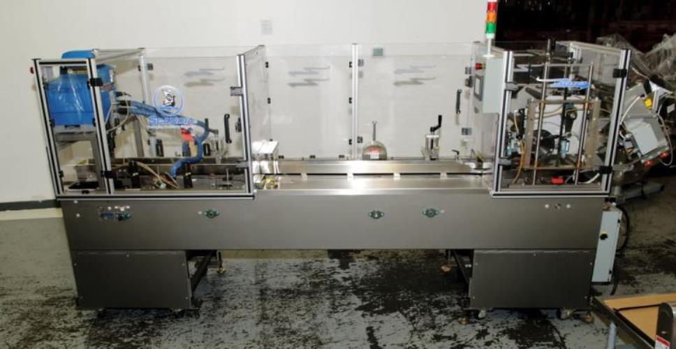 Scandia Model 420 continuous motion semi-automatic hand load cartoning ...